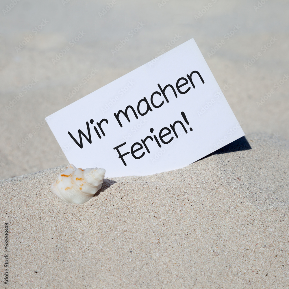 Muschel im Sand mit Karte WIR MACHEN FERIEN Stock Photo | Adobe Stock
