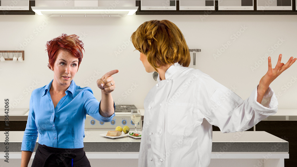 Chef and waitress fighting in the kitchen Stock Photo | Adobe Stock