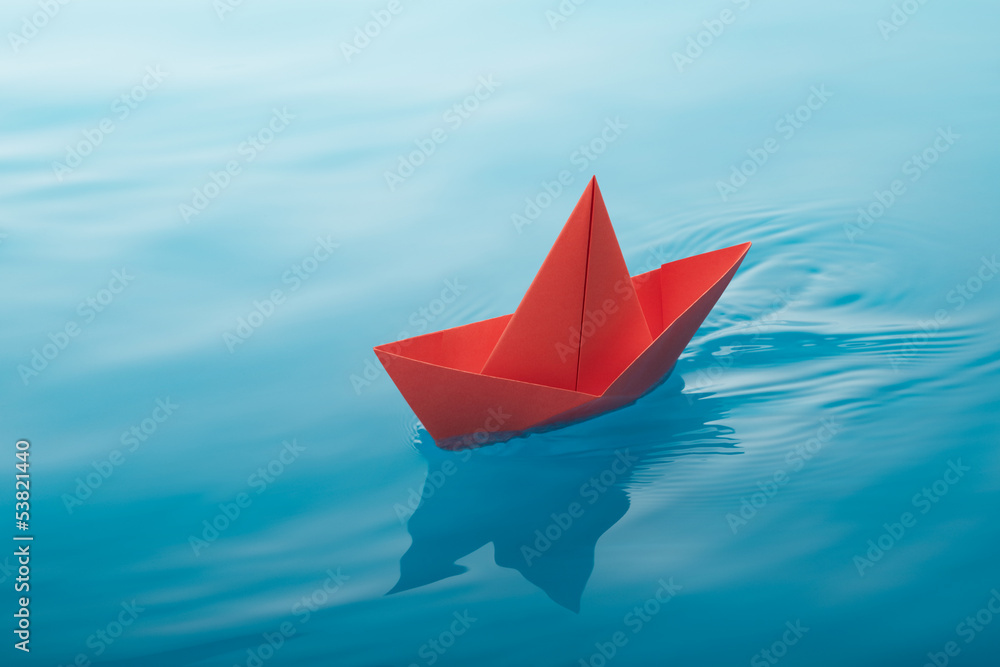 paper boat sailing Stock Photo | Adobe Stock