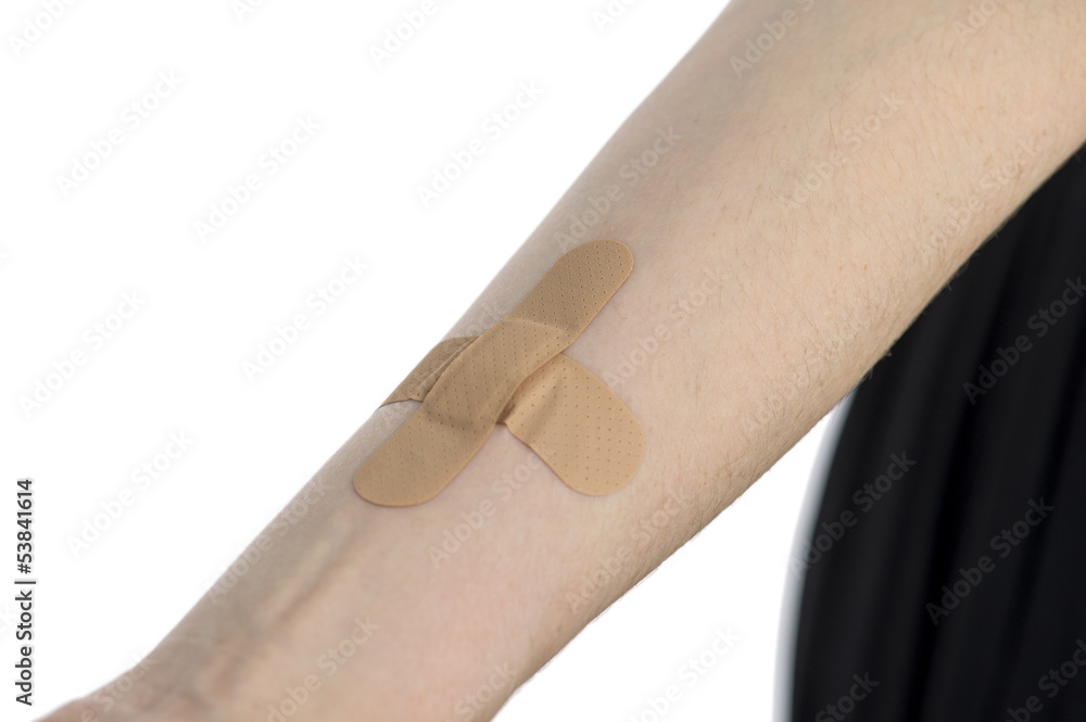 Versorgung der Wunde mit einem Pflaster Stock Photo | Adobe Stock