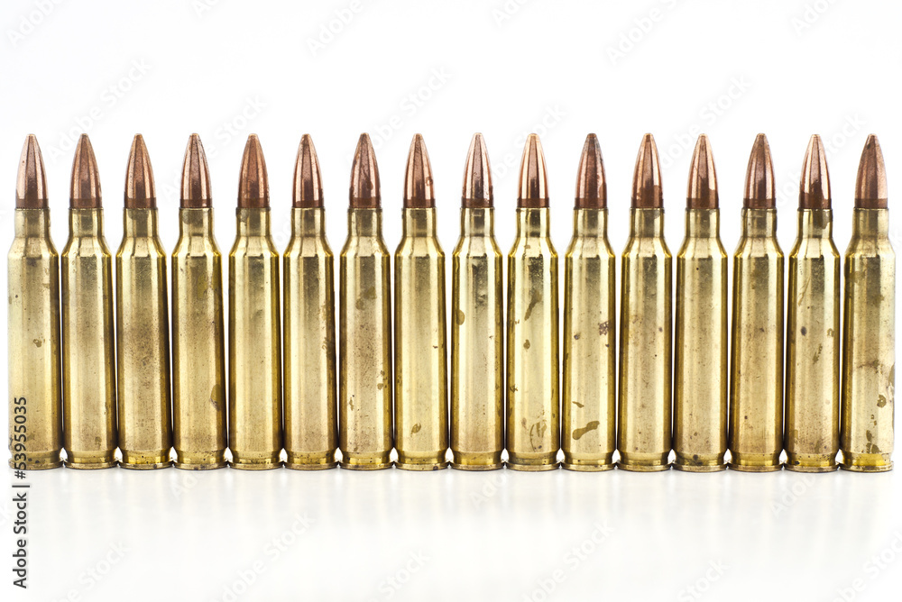 Cartridge 5.56 mm caliber, Machine gun bullet isolated. Stock Photo ...