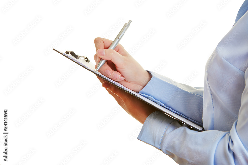 Hand mit Stift und Checkliste Stock Photo | Adobe Stock