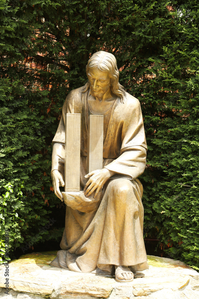 Statue of Jesus Christ holding World Trade Center buildings Stock Photo ...