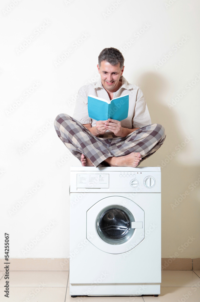 Men and washing machine Stock Photo | Adobe Stock