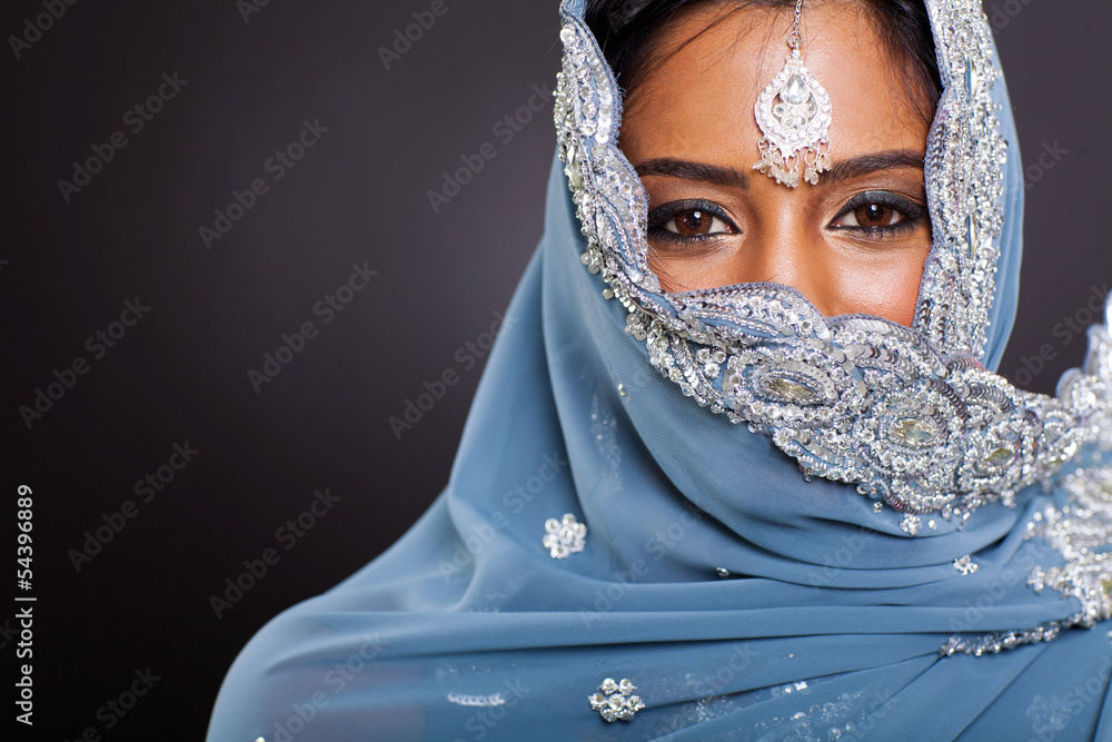 indian woman in sari with her face covered Stock Photo | Adobe Stock