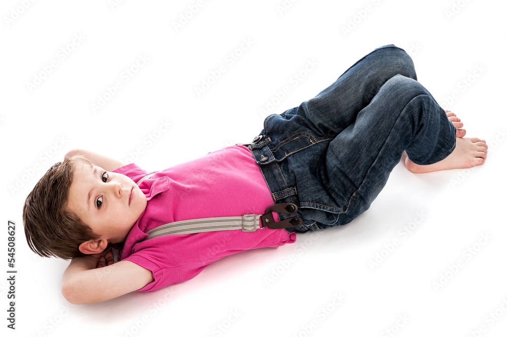 Handsome Young Boy Lying Down. Stock Photo | Adobe Stock