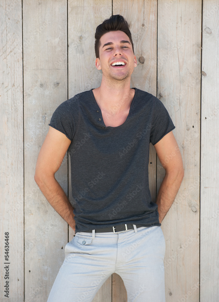 Cute young guy smiling outdoors Stock Photo | Adobe Stock