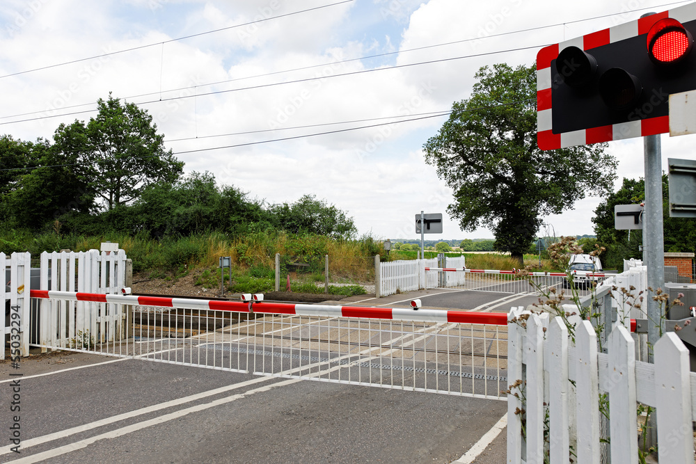 Rural Level Crossing with Barriers Closed Stock Photo | Adobe Stock
