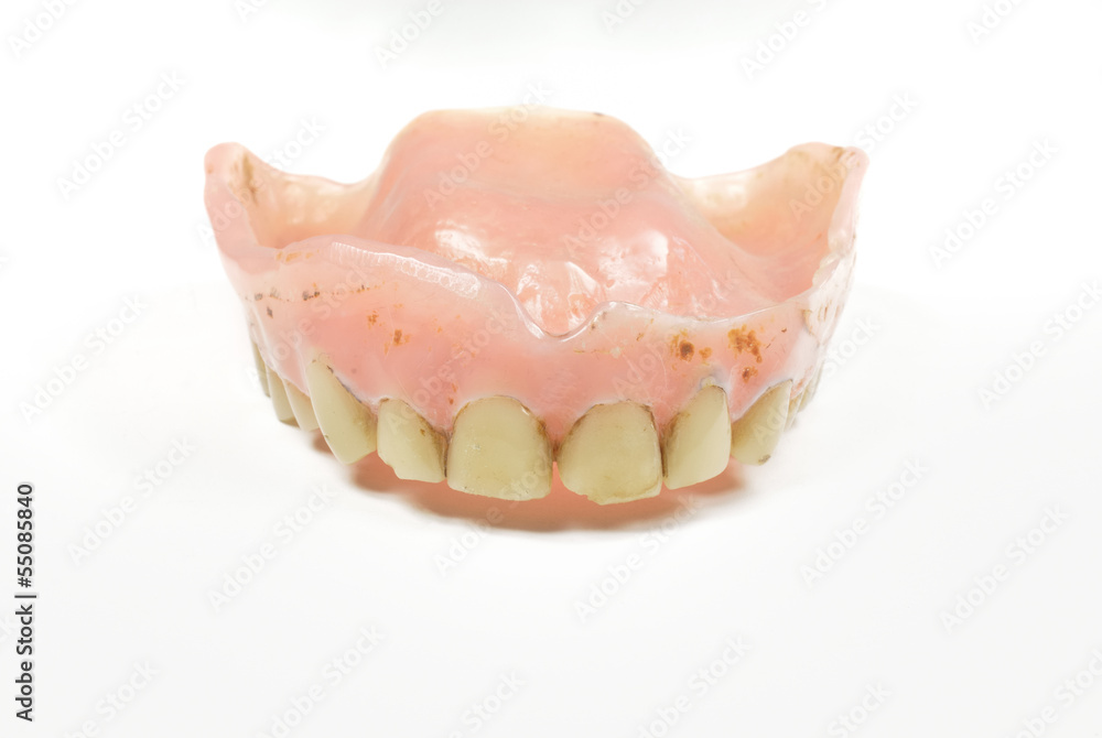 Foto Stock worn and stained denture | Adobe Stock