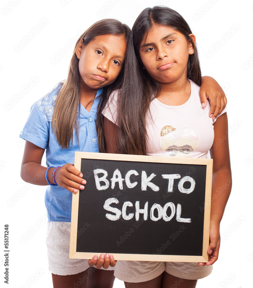 sad student girls holding a blackboard on a white background Stock ...