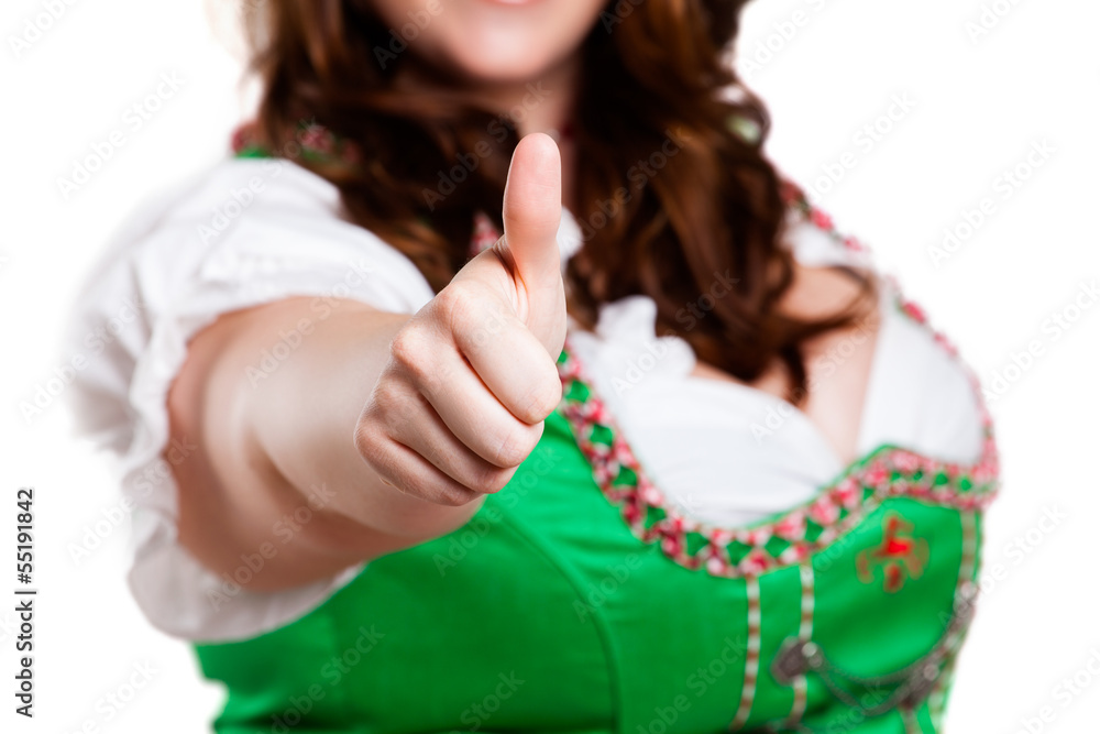 junge Frau im Dirndl zeigt Top-Daumen Stock Photo | Adobe Stock