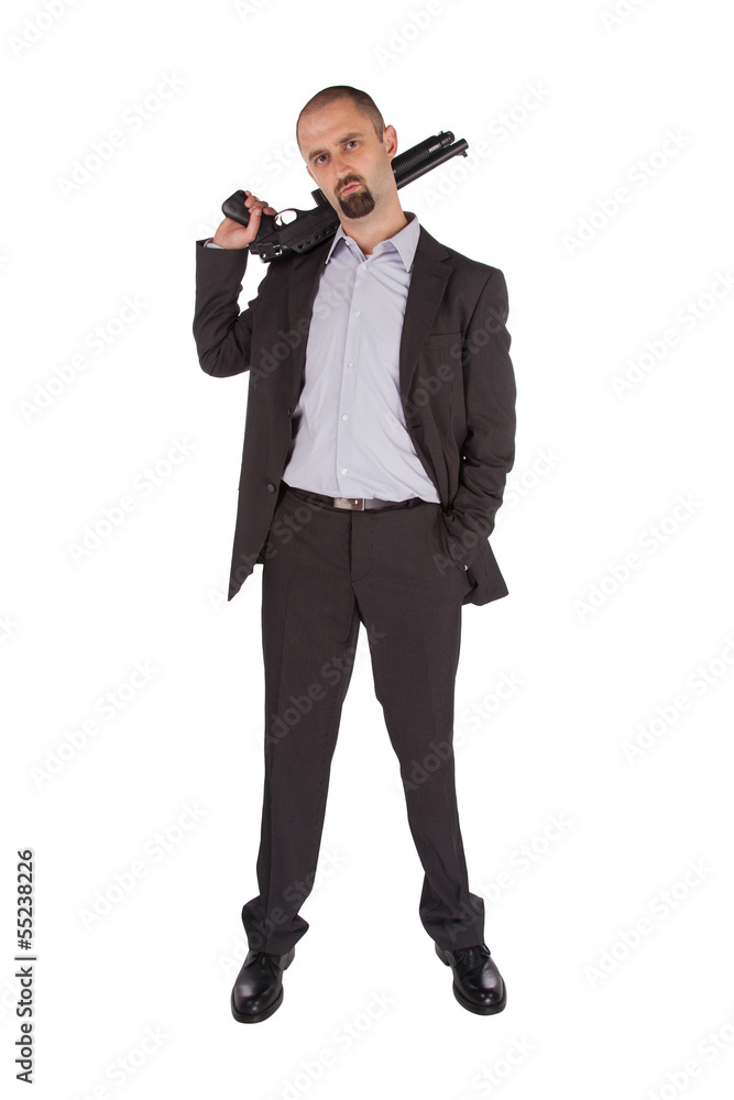 Mafia man is holding a shotgun Stock Photo | Adobe Stock