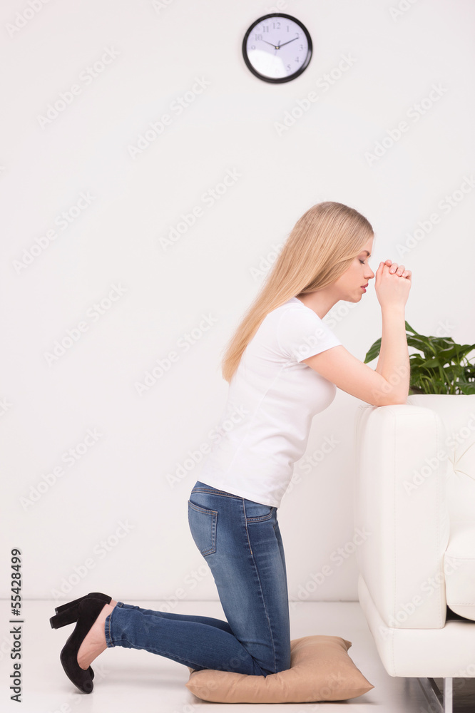 Girl praying. Side view of beautiful young blond hair woman pray Stock ...