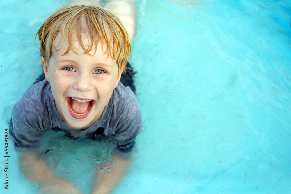 Smiling Child in Baby Pool Stock Photo | Adobe Stock