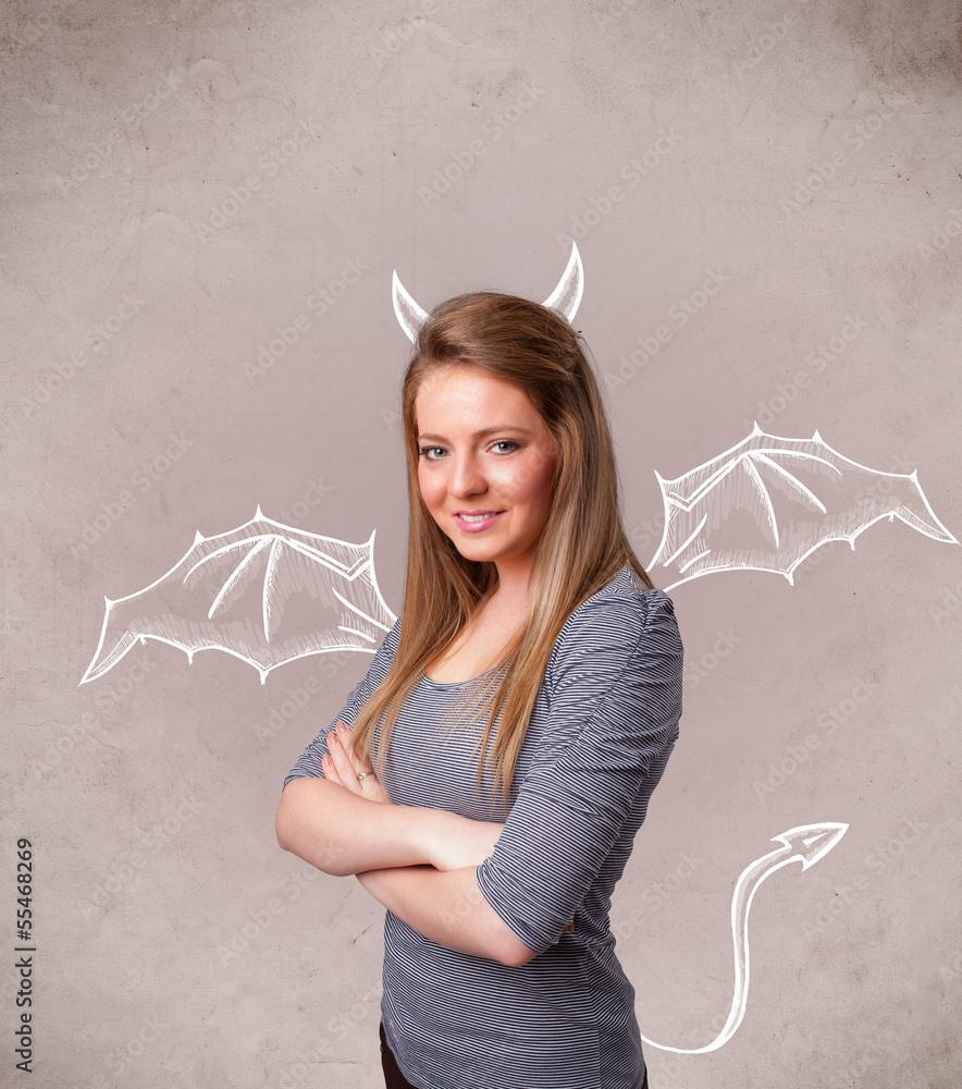 Young girl with devil horns and wings drawing Stock Photo | Adobe Stock