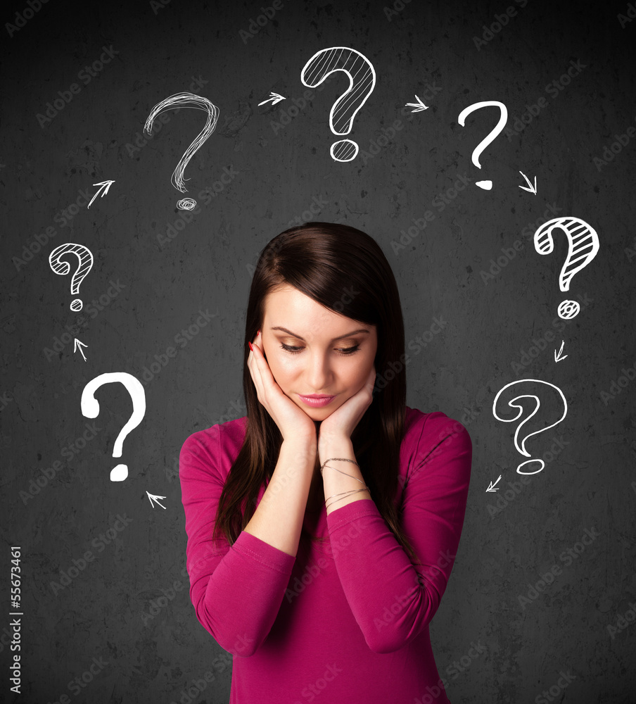Young woman thinking with question mark circulation around her h Stock ...