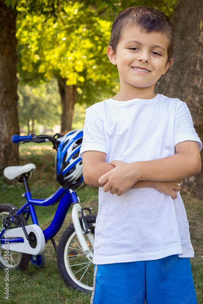 Little boy with bike Stock Photo | Adobe Stock