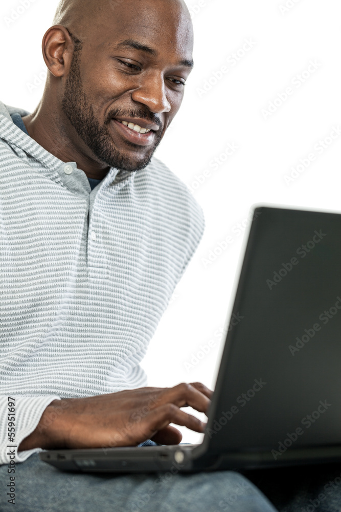 Black Man on Laptop Stock Photo | Adobe Stock