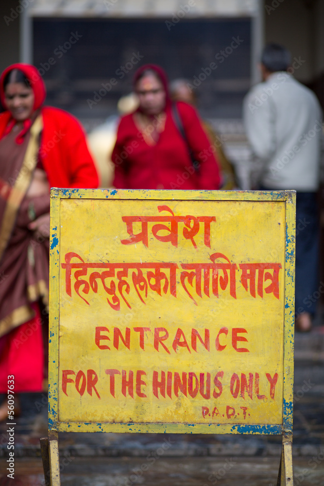 Yellow signboard in front of a Hindu temple in Kathmandu. Stock Photo ...