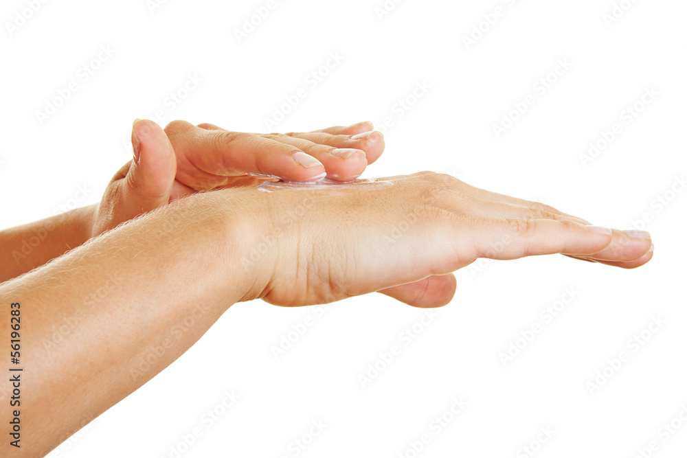 Hands applying moisturizer for skin treatment Stock Photo | Adobe Stock