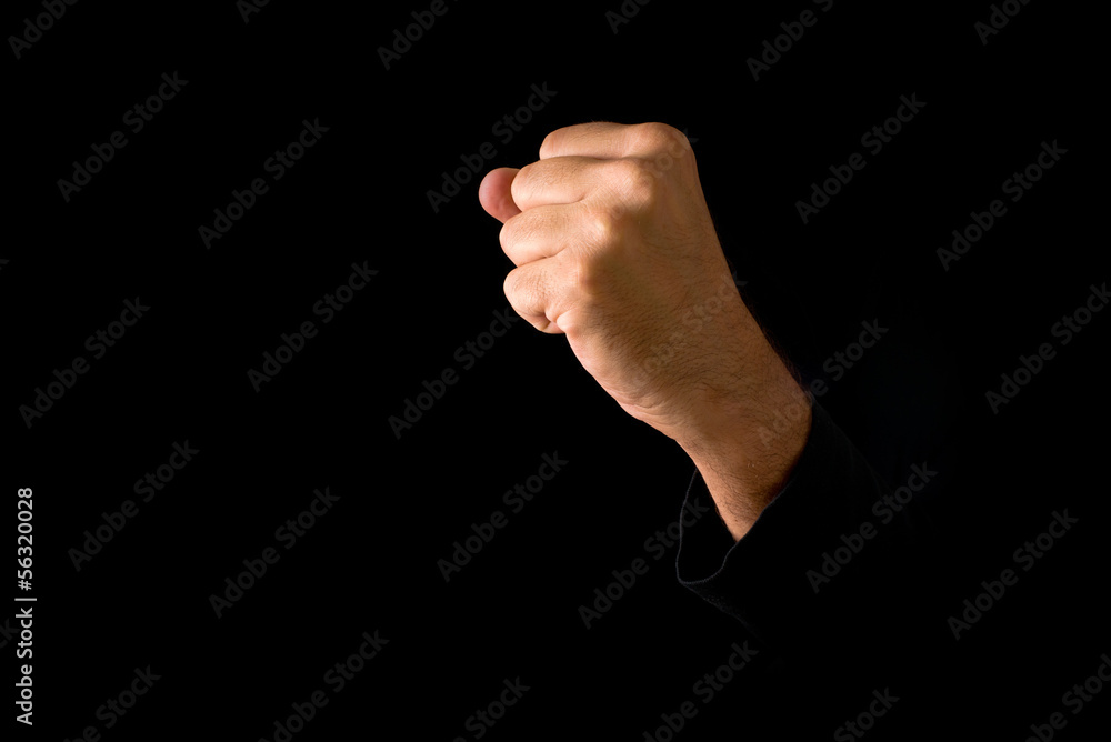 Hand with clenched fist Stock Photo | Adobe Stock