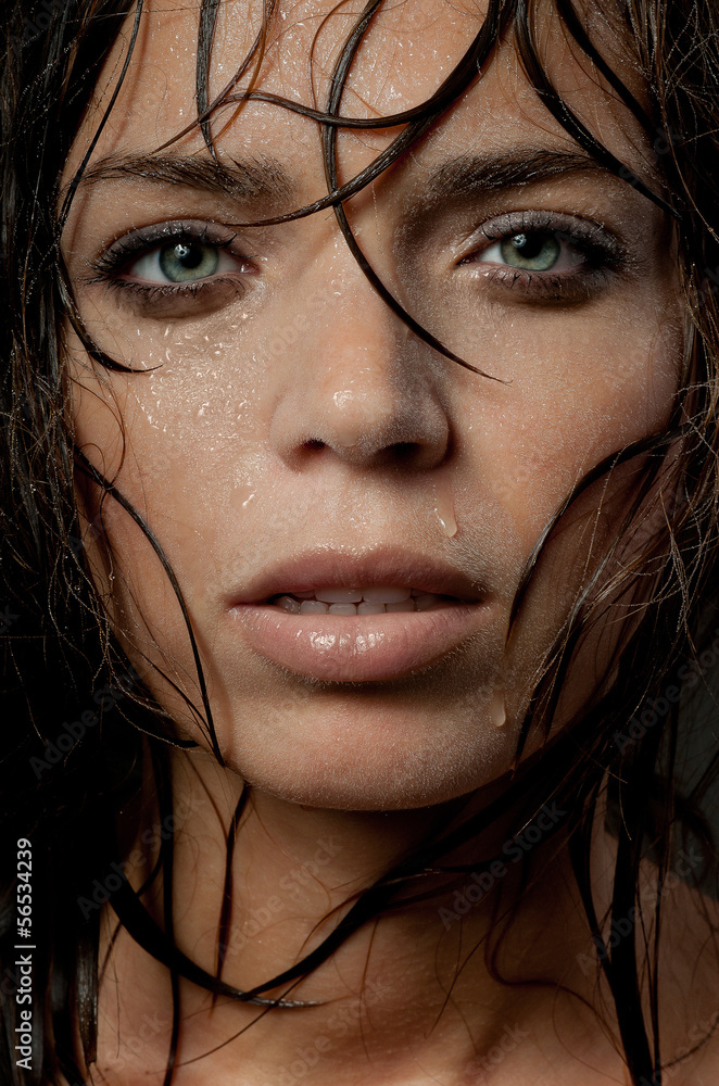 wet woman's face Stock Photo | Adobe Stock