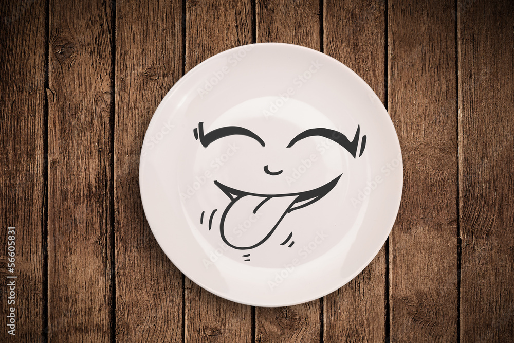 Happy smiley cartoon face on colorful dish plate Stock Photo | Adobe Stock