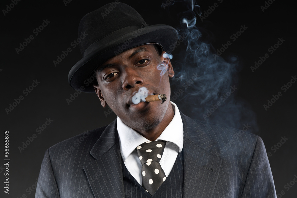 Retro african american mafia man wearing striped suit and tie an Stock ...