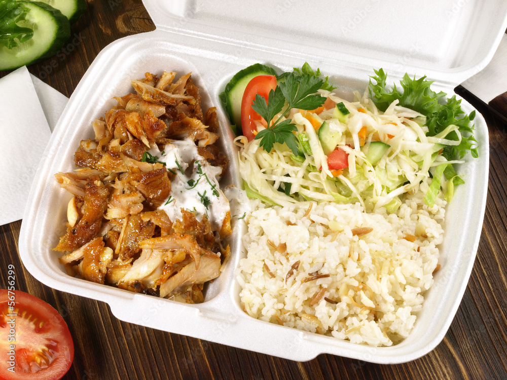 Döner Kebab mit Reis zum mitnehmen Stock Photo | Adobe Stock