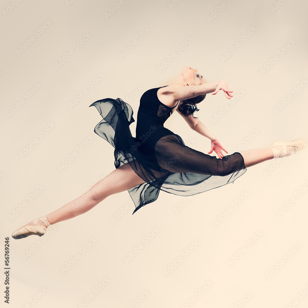 Beautiful ballet-dancer posing on studio background Stock Photo | Adobe ...