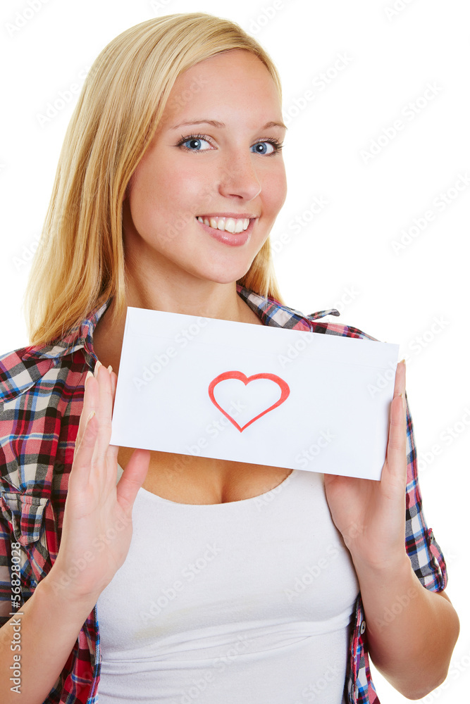 Young woman holding love letter Stock Photo | Adobe Stock