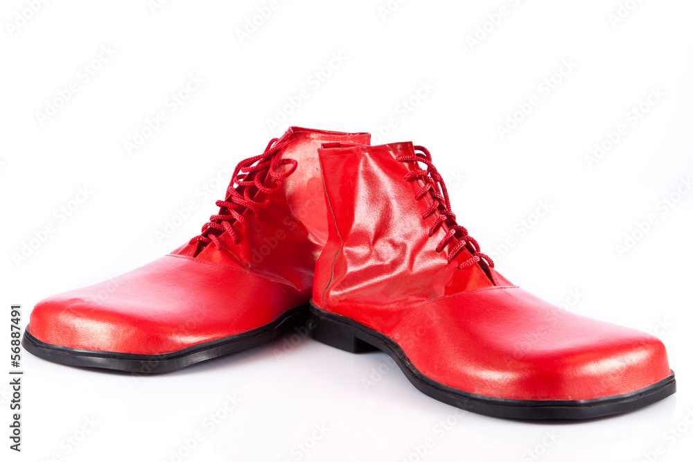 Very big red clown shoes on white Stock Photo | Adobe Stock