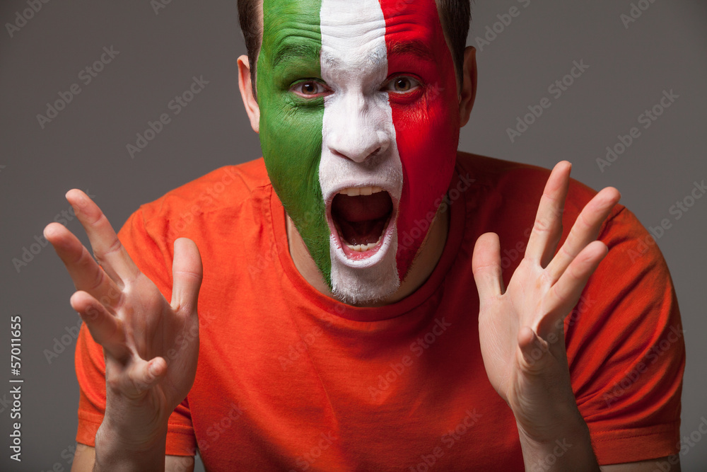 Italian football fan with painted face screaming Stock-Foto | Adobe Stock