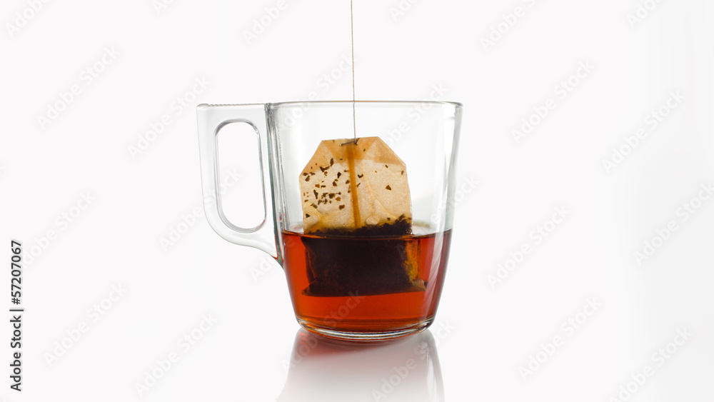 red teabag in a crystal cup Stock Photo | Adobe Stock