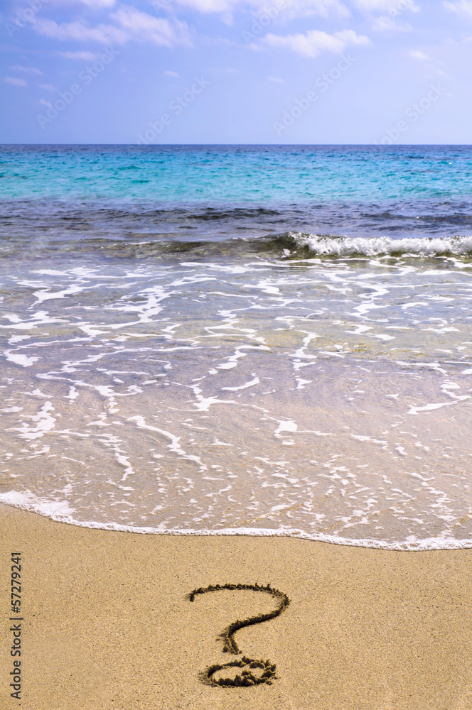 question mark sign in sand beach, sea water and clear blue sky Stock ...