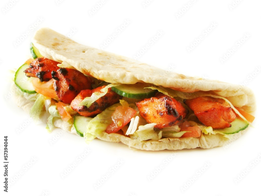 chicken tikka naan bread with salad Stock Photo | Adobe Stock