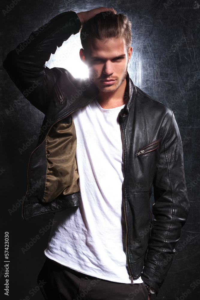 fashion model moving his hand through his long hair Stock Photo | Adobe ...