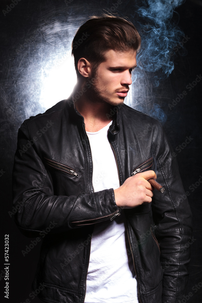 fashion model in leather jacket smoking a big cigar Stock Photo | Adobe ...
