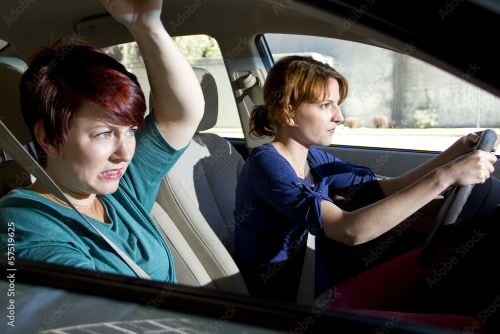 two women bracing for a car crash accident Stock Photo | Adobe Stock