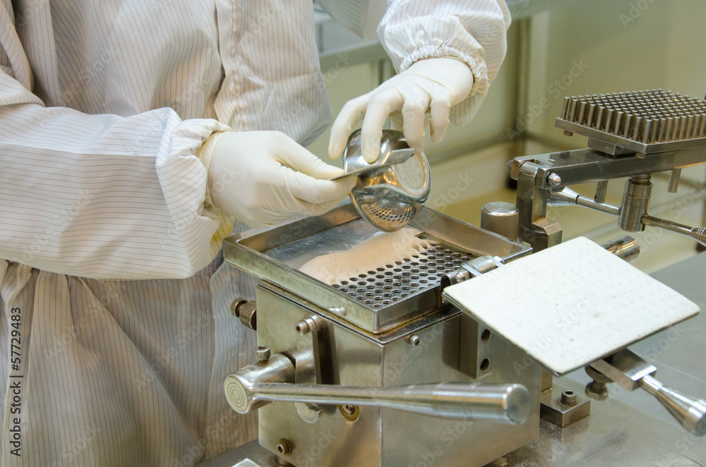 pharmacist preparing medication with packaging capsule Stock Photo ...
