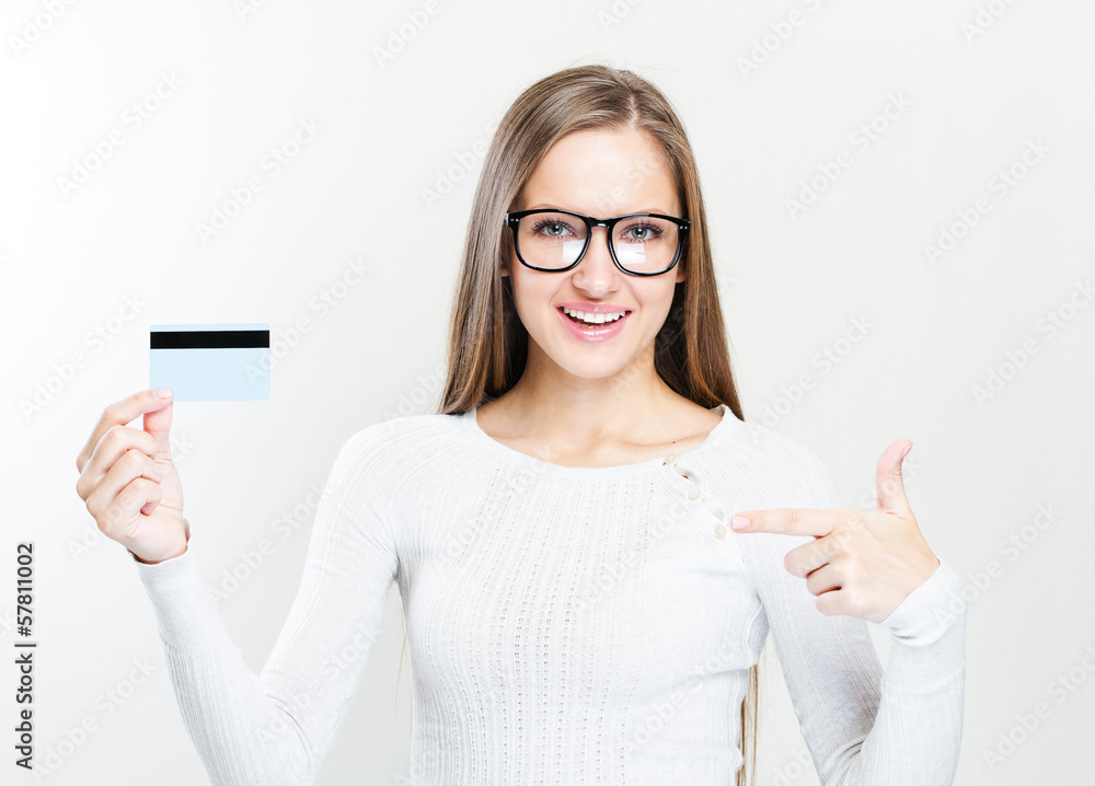 happy woman holding credit card Stock Photo | Adobe Stock