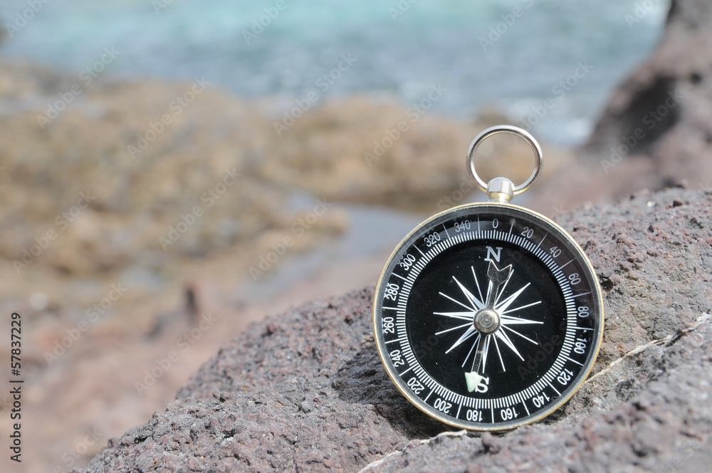 Compass and Ocean - Orientation Concept Stock Photo | Adobe Stock