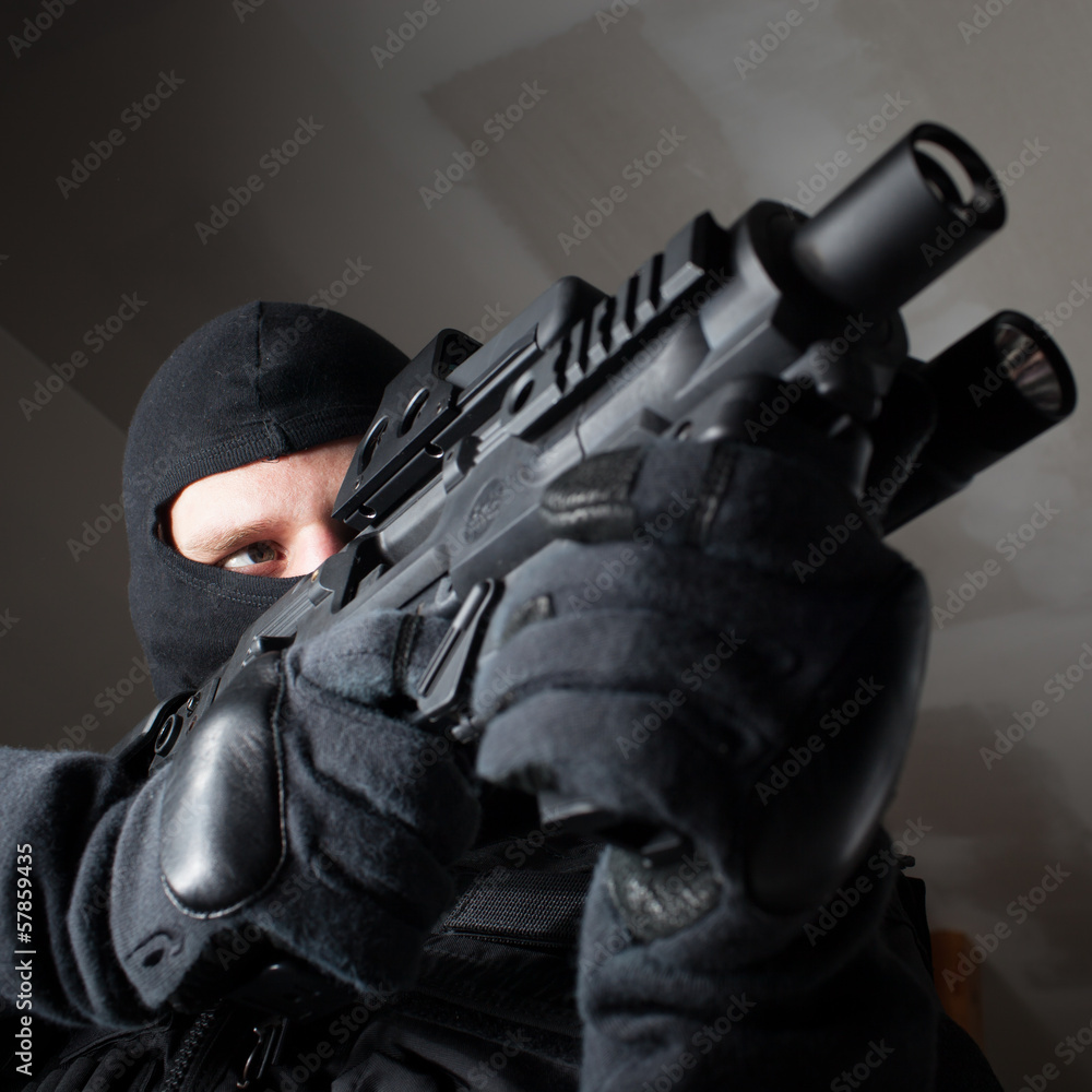 Special forces soldier is aiming and shooting on the target Stock Photo ...