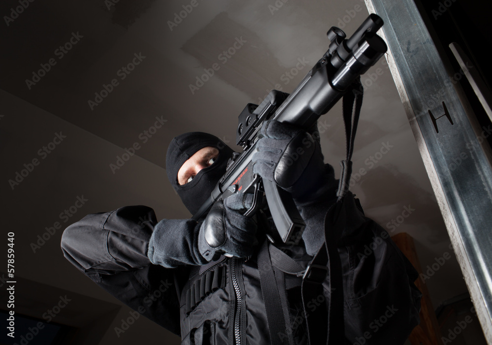 Special forces soldier is aiming and shooting on the target Stock Photo ...