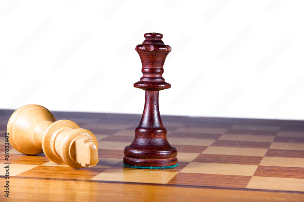 Checkmate white king lying in front of the white queen Stock Photo ...