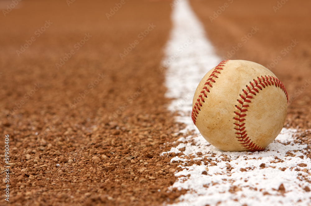 Worn Baseball on the Chalk Line Stock Photo | Adobe Stock