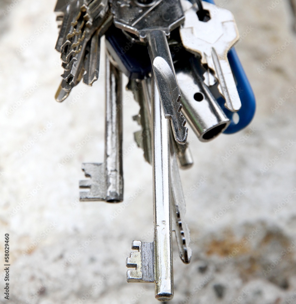 key and other keys to open the door lock Stock Photo | Adobe Stock