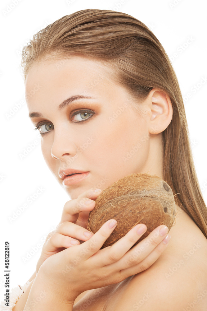 Attractive young woman with coconut. Closeup. Stock-Foto | Adobe Stock