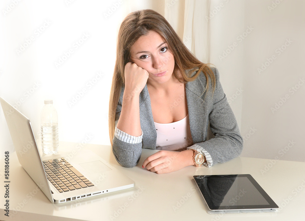 Young Business Woman boring at work Stock-Foto | Adobe Stock