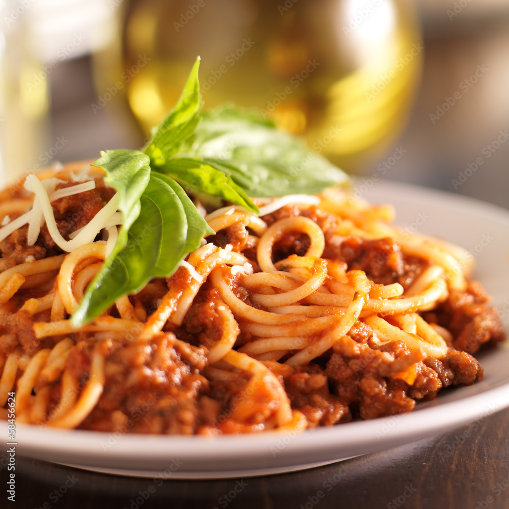 spaghetti dinner with meat sauce and basil Stock Photo | Adobe Stock